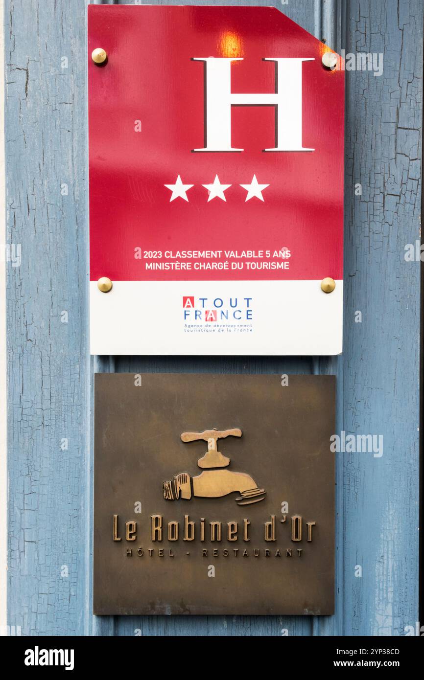Sign outside Le Robinet d'Or hotel & restaurant in Rue Robert Blache ...