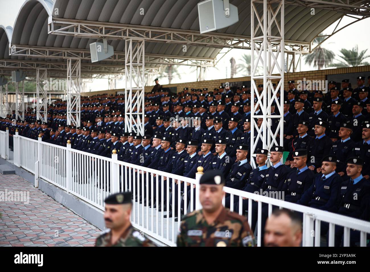 Iraqi police cadets take part in a rehearsal of the police cadet ...
