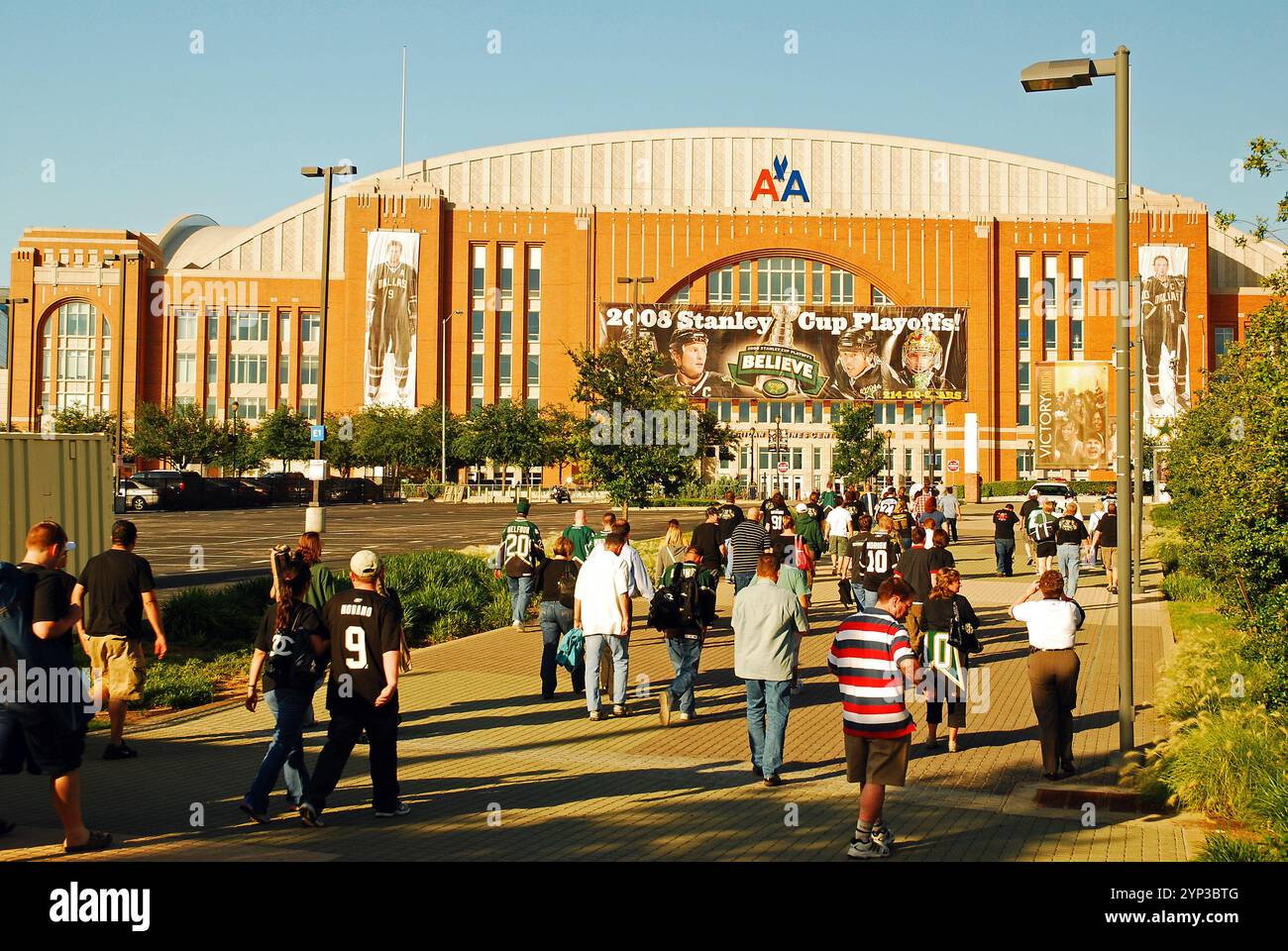 Hockey fans make their way to the American Airlines Arena to see a game ...