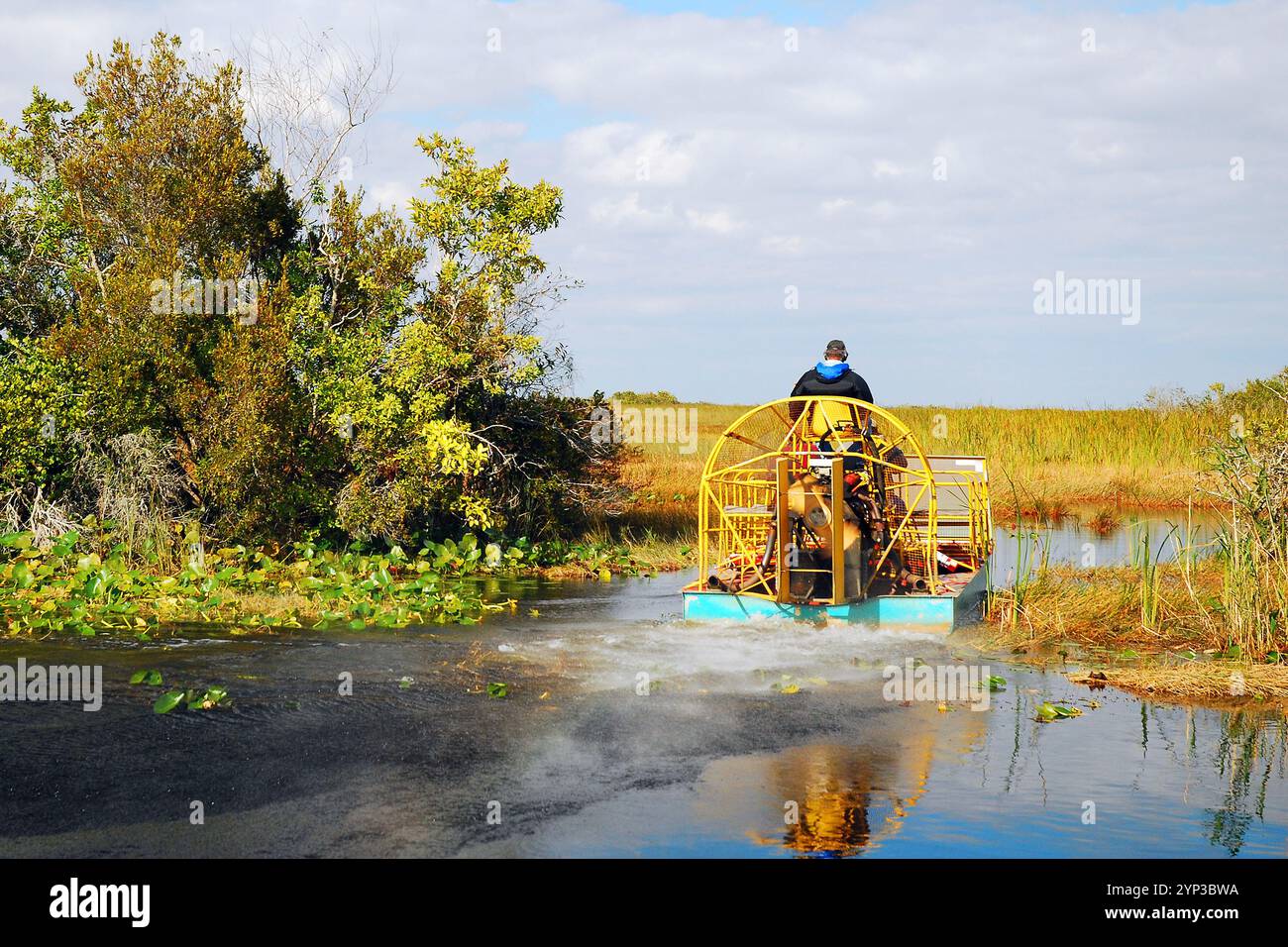 A Fan Boat Departs the dock to Tour the Everglades National Park and ...