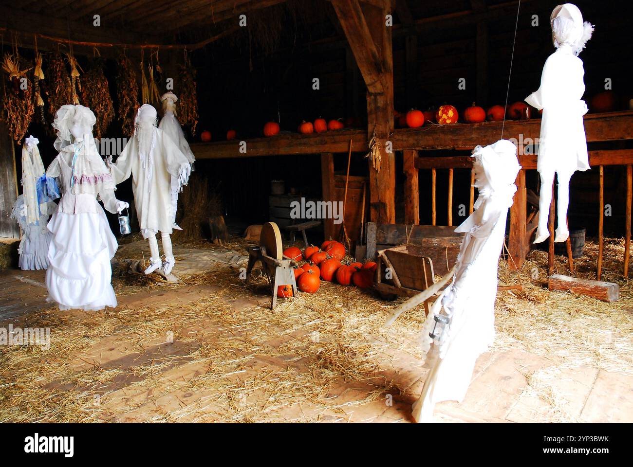 Halloween decorations are arranged to appear as a ghost dance in a ...