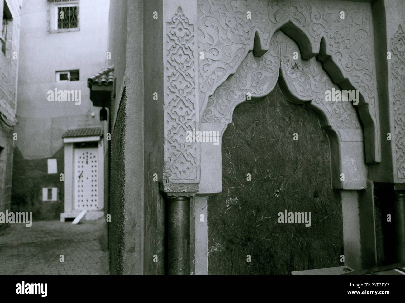 In the alley streets of the kasbah souk in the old city of Marrakesh in ...