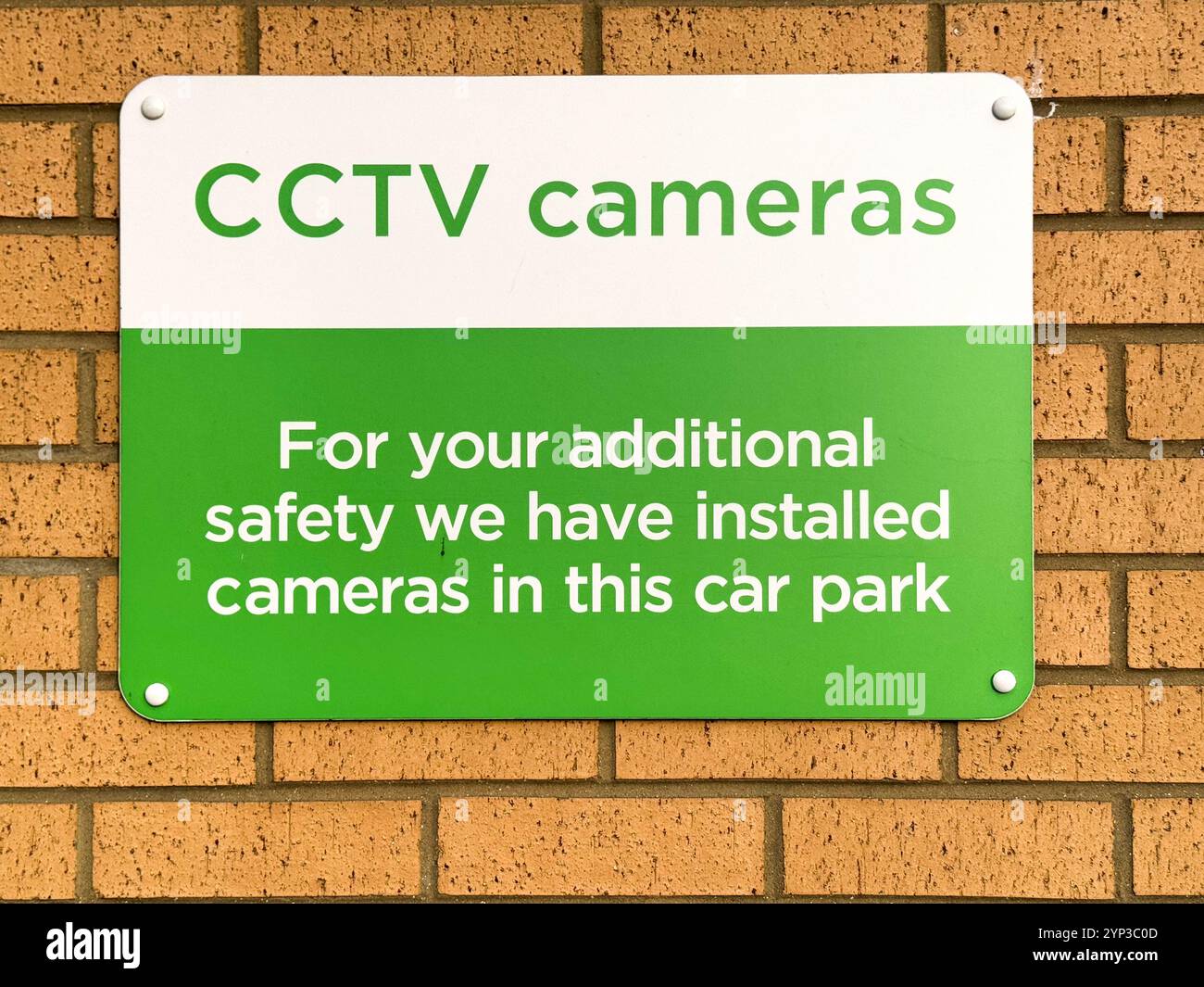 Signage at Asda informing that CCTV cameras are installed in the car ...