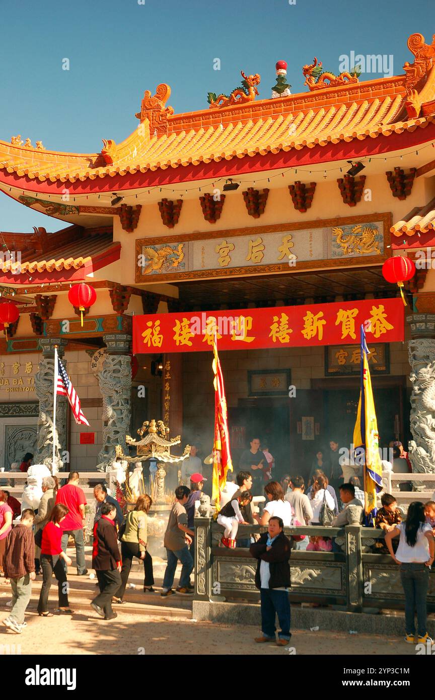Celebrants congregate outside of a Buddhist temple in Los Angeles for ...