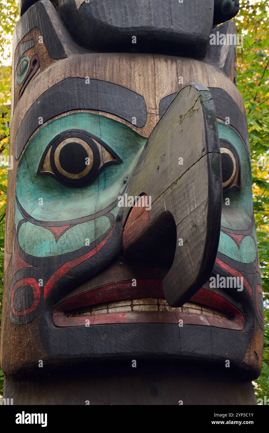 Details of a wooden totem pole, a traditional Native American craft and ...
