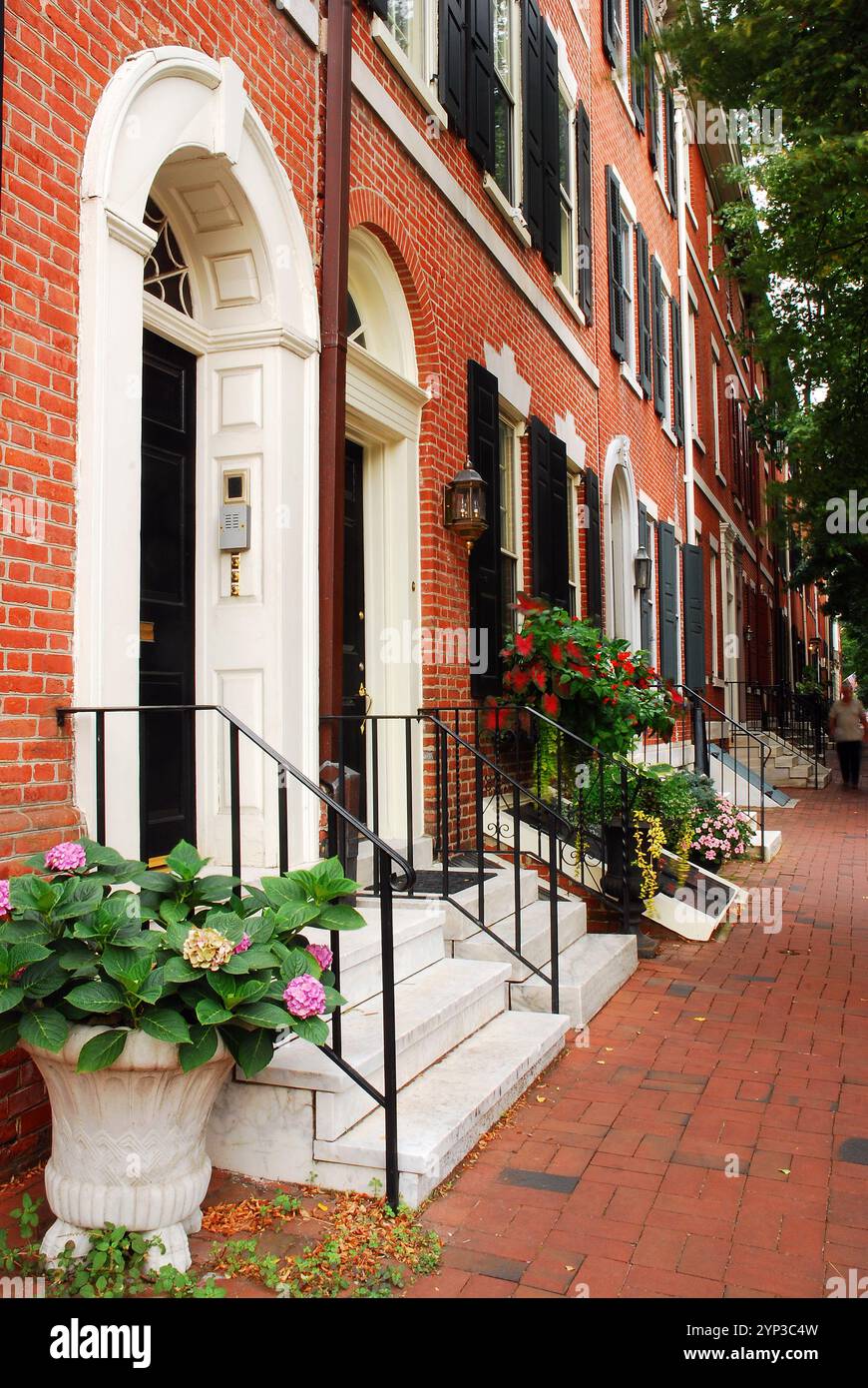 Historic and elegant brick row homes stand in the Society Hill ...