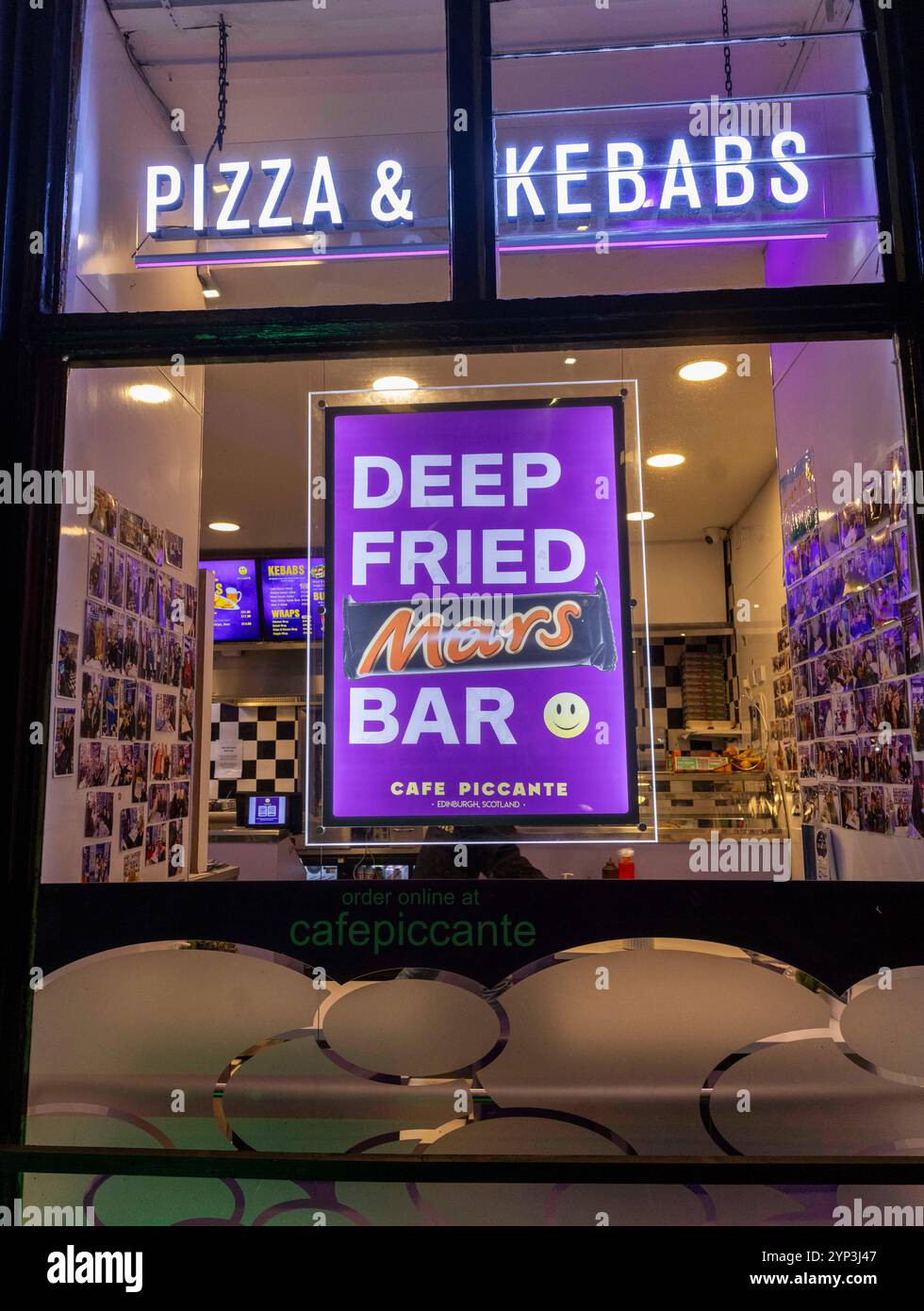 A cafe in Edinburgh advertising Deep fried Mars bars in the window ...