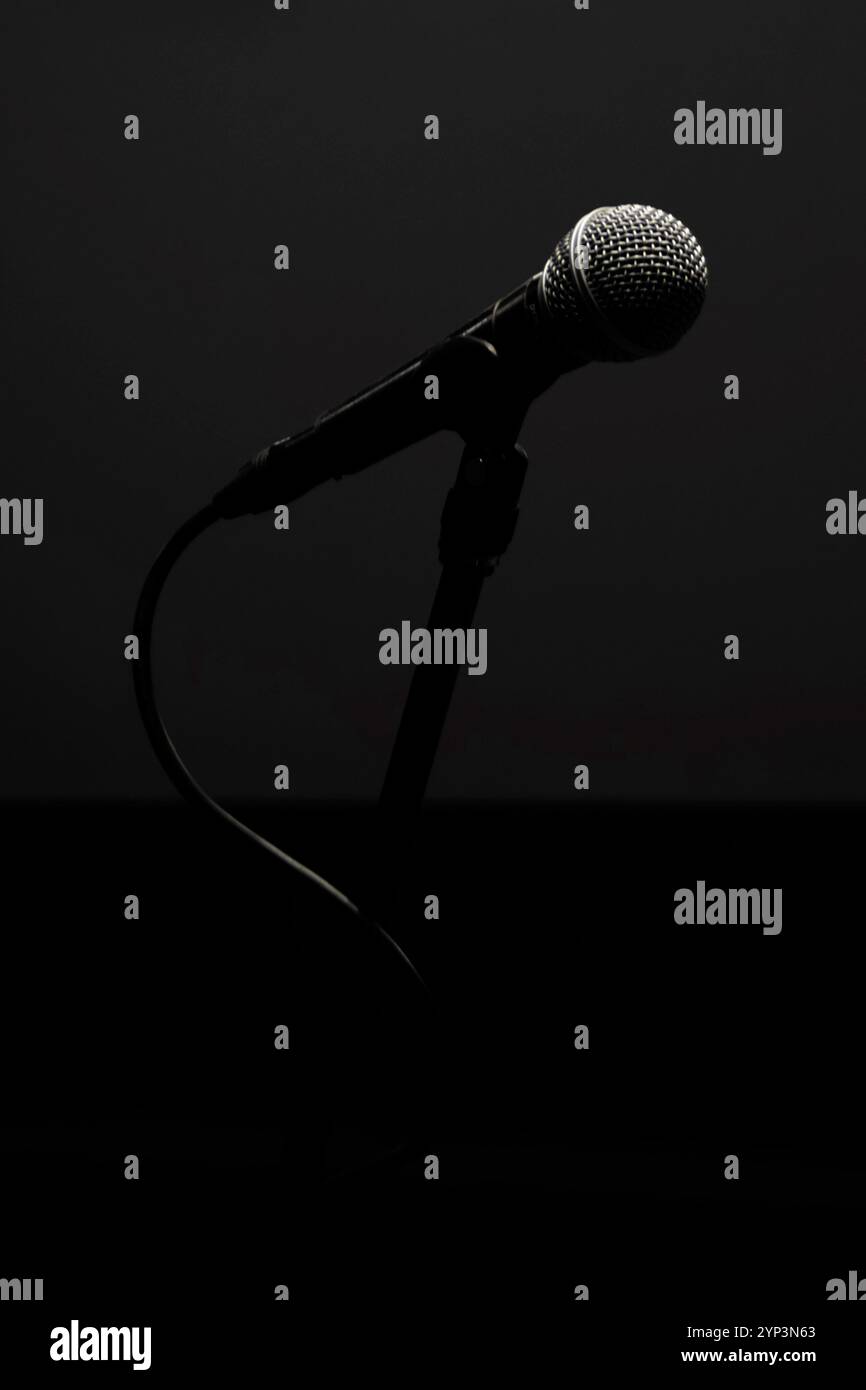 Microphone on stage Stock Photo - Alamy
