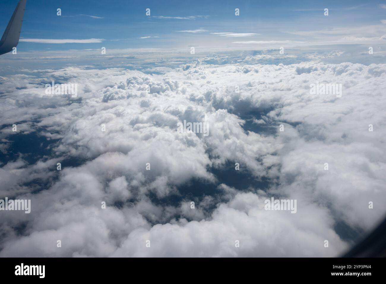 Clouds from the plane window Stock Photo - Alamy
