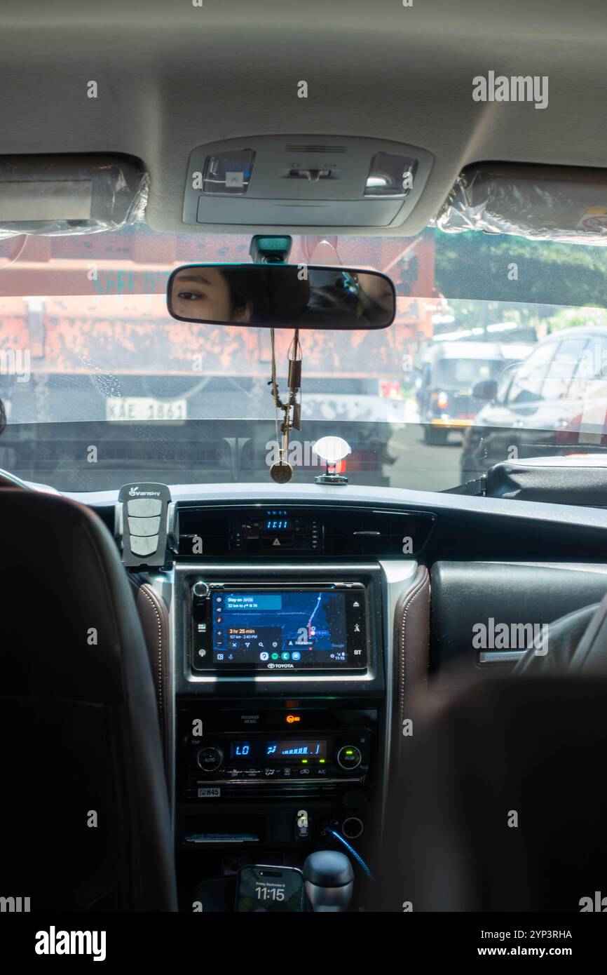 Inside an SUV with google maps in the Philippines Stock Photo - Alamy