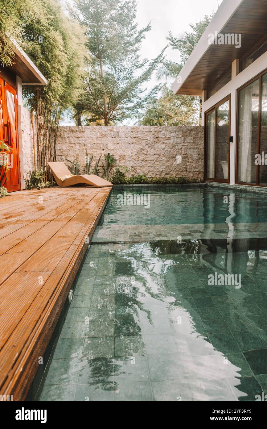 Beautiful swimming pool inside a tropical beach resort in the ...