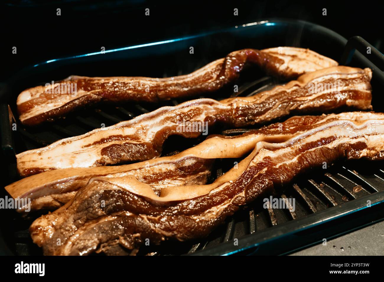 Grilling a pork belly liempo in a Ninja Foodie indoor grill. This is a ...