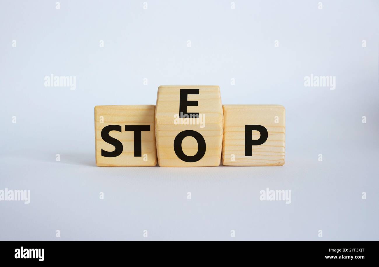 Step vs Stop symbol. Wooden cubes with words Stop and Step. Beautiful ...