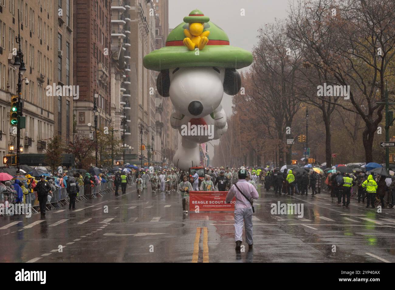 Snoopy balloon floats by along Central Park West during the Macy's ...