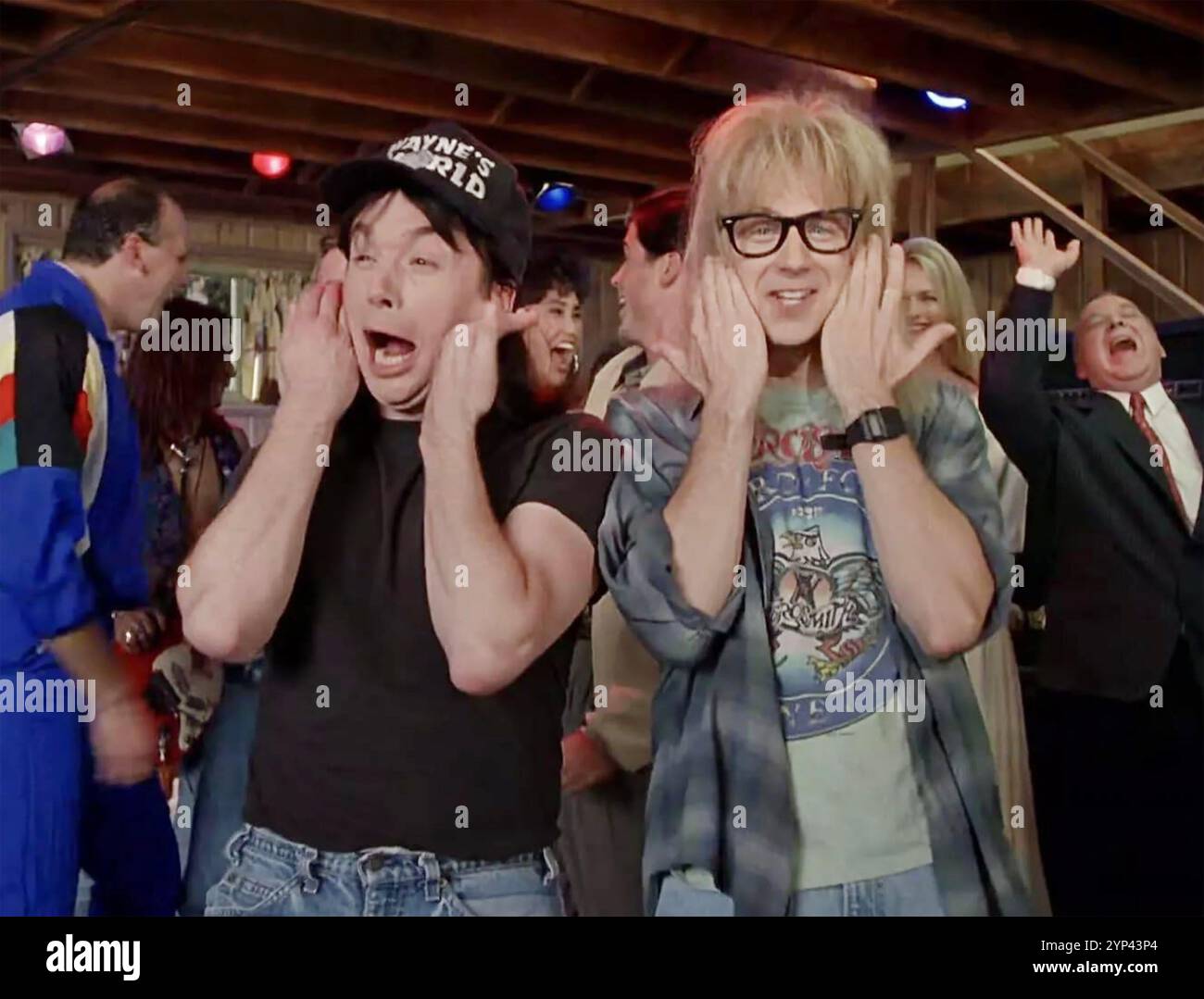 WAYNE'S WORLD 1992 Paramount Pictures film with Mike Myers as Wayne Campbell at right and Dana ...