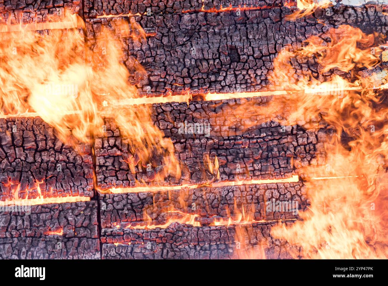 Building Siding Burning to Coals Stock Photo - Alamy