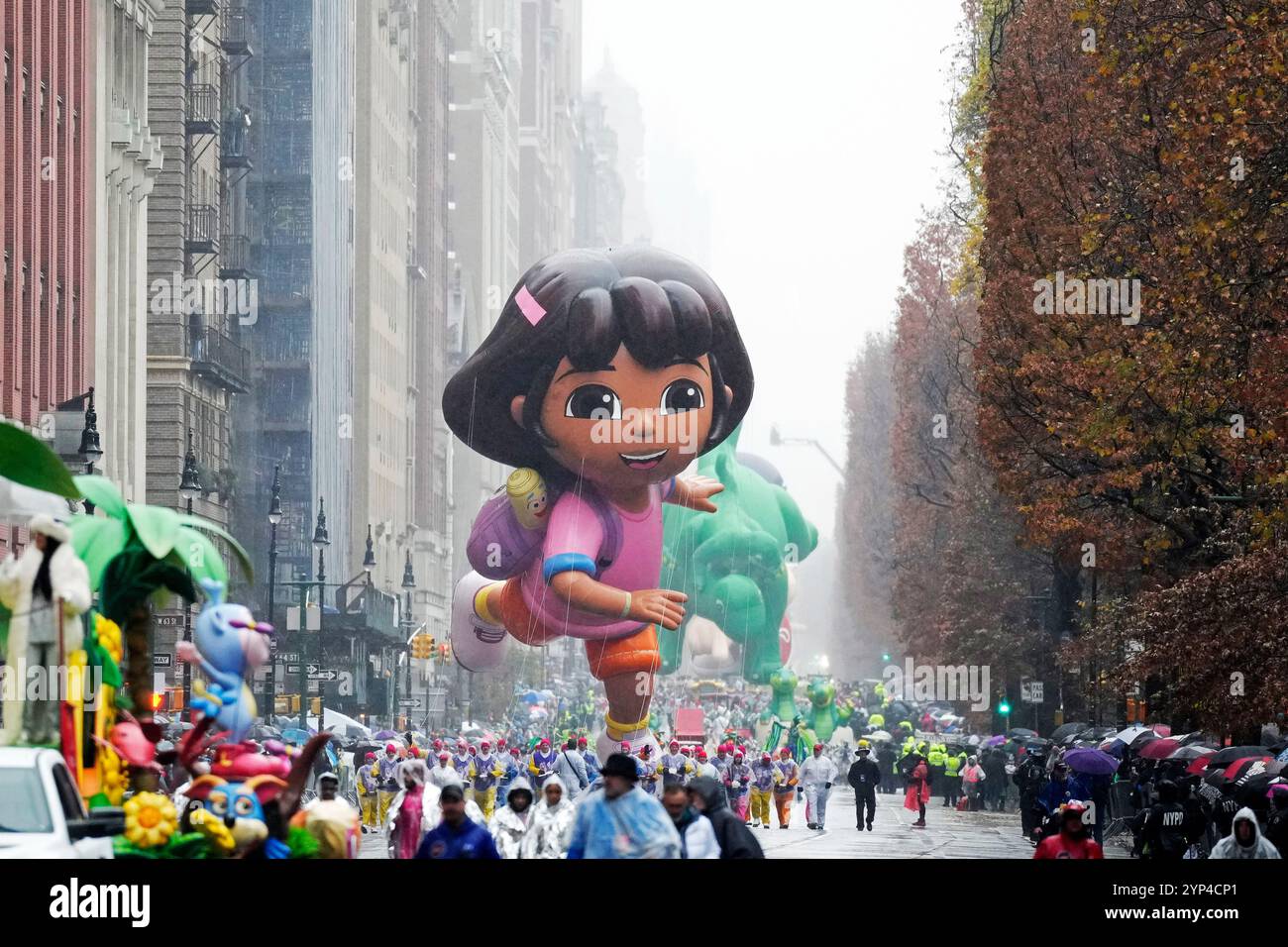 The Dora the Explorer balloon floats in the Macy's Thanksgiving Day ...