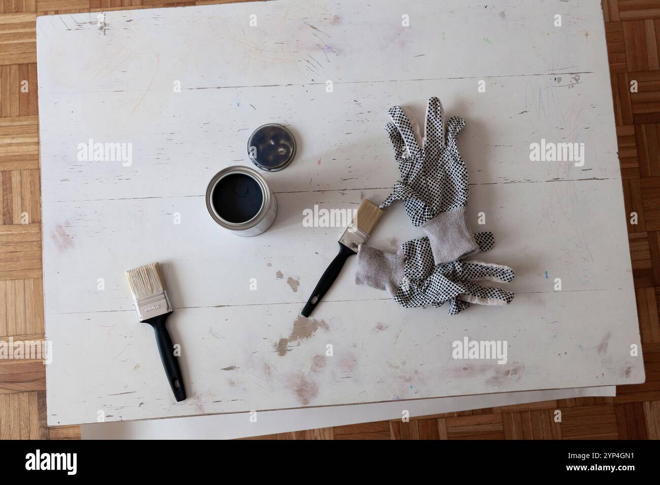 Top view of table renovation with brushes, paint and gloves Stock Photo ...