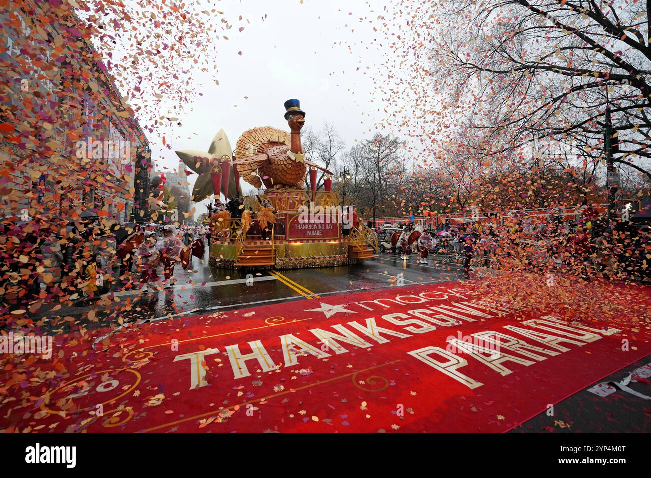 The Tom Turkey float rides in the Macy's Thanksgiving Day Parade on ...