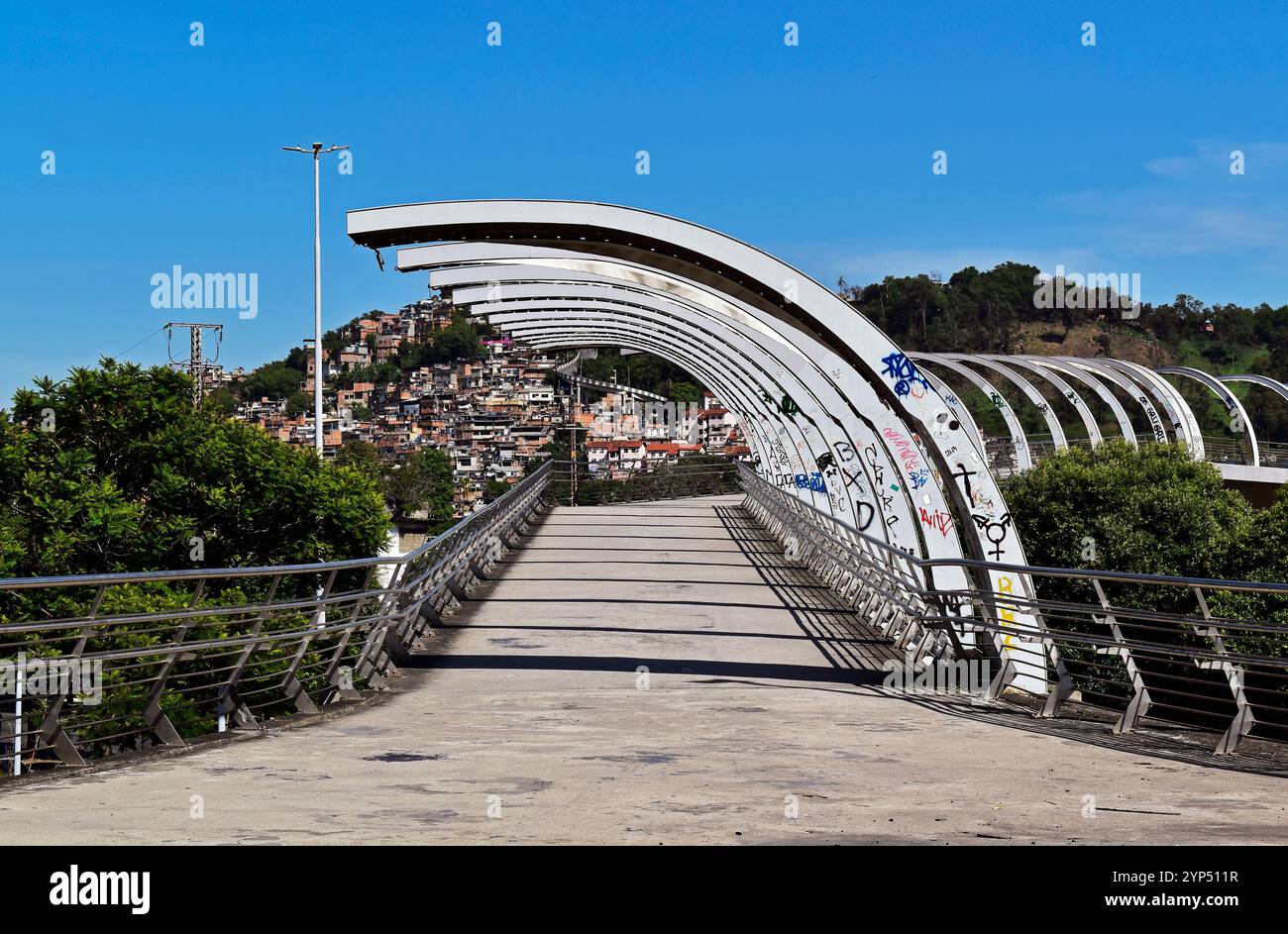 Concrete pedestrian bridge over Avenida Rei Pelé in Maracanã district ...