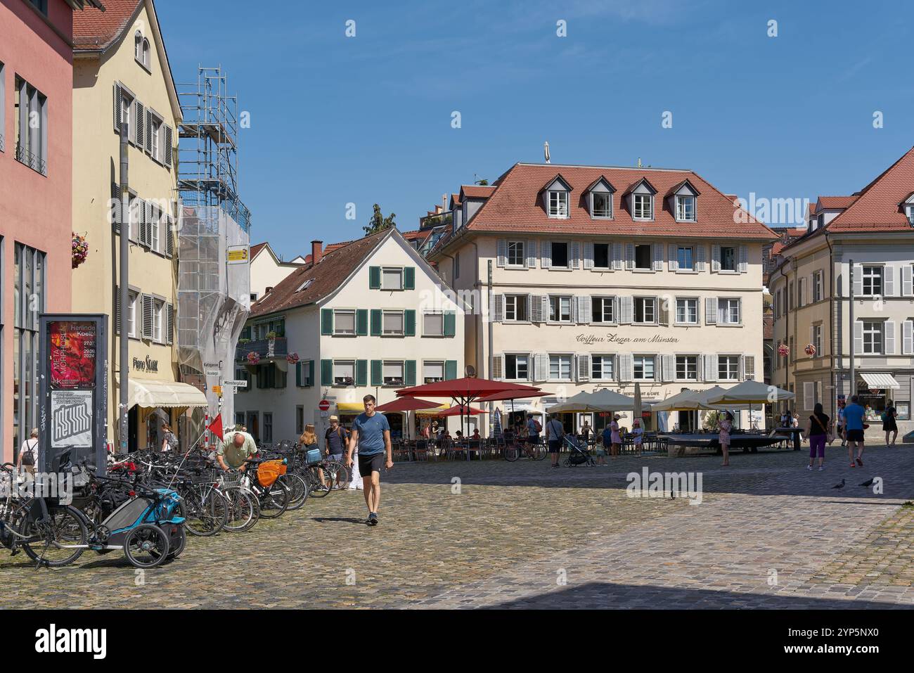 Stores and restaurants on Muensterplatz in the old town of Constance on ...