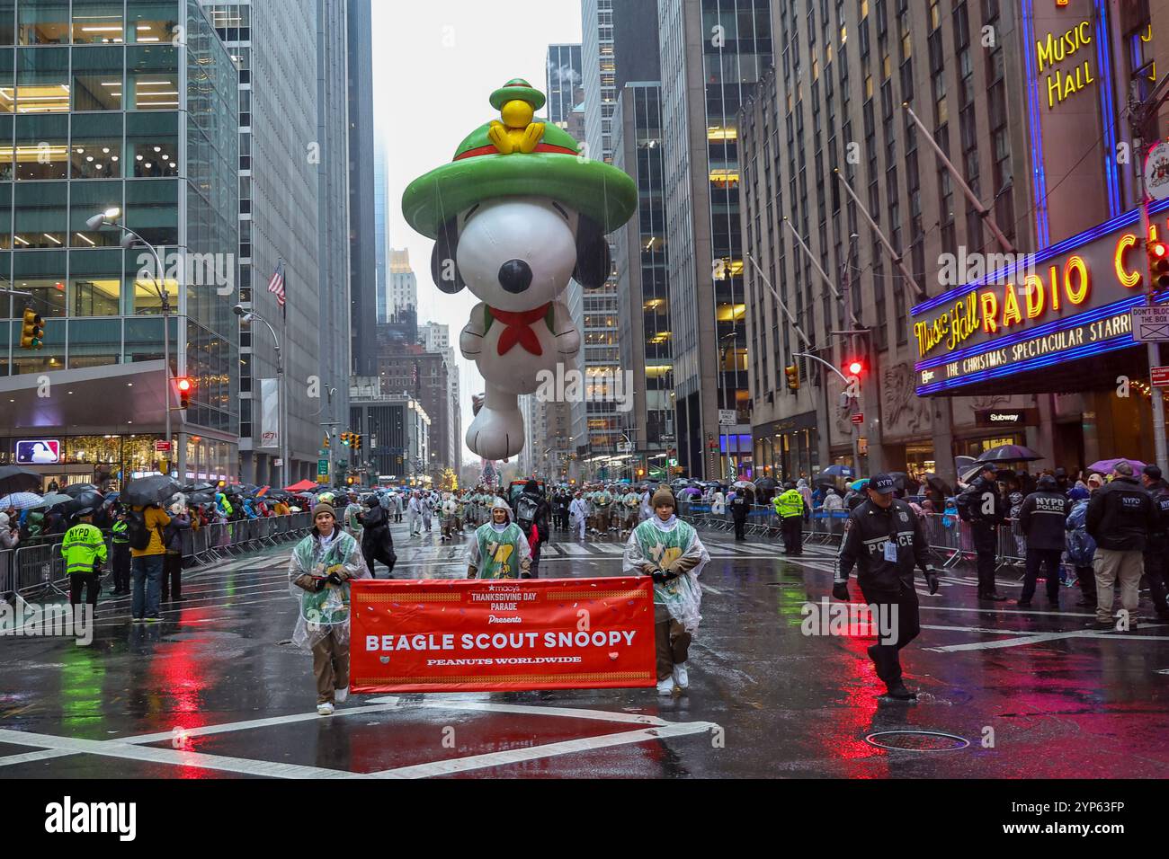 The Beagle Scout Snoopy heads down Sixth Avenue during The 98th Macy's ...