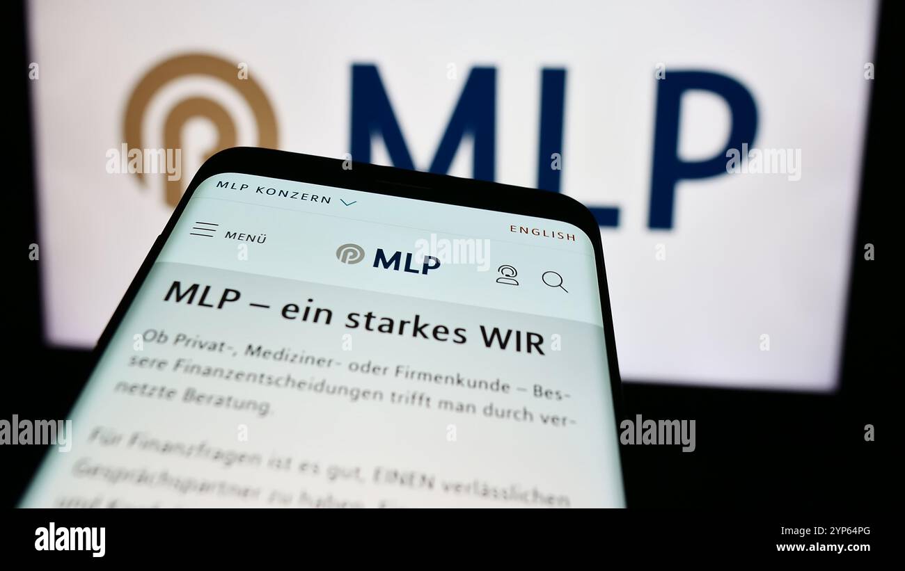 In this photo illustration, a smartphone with the web page of German ...