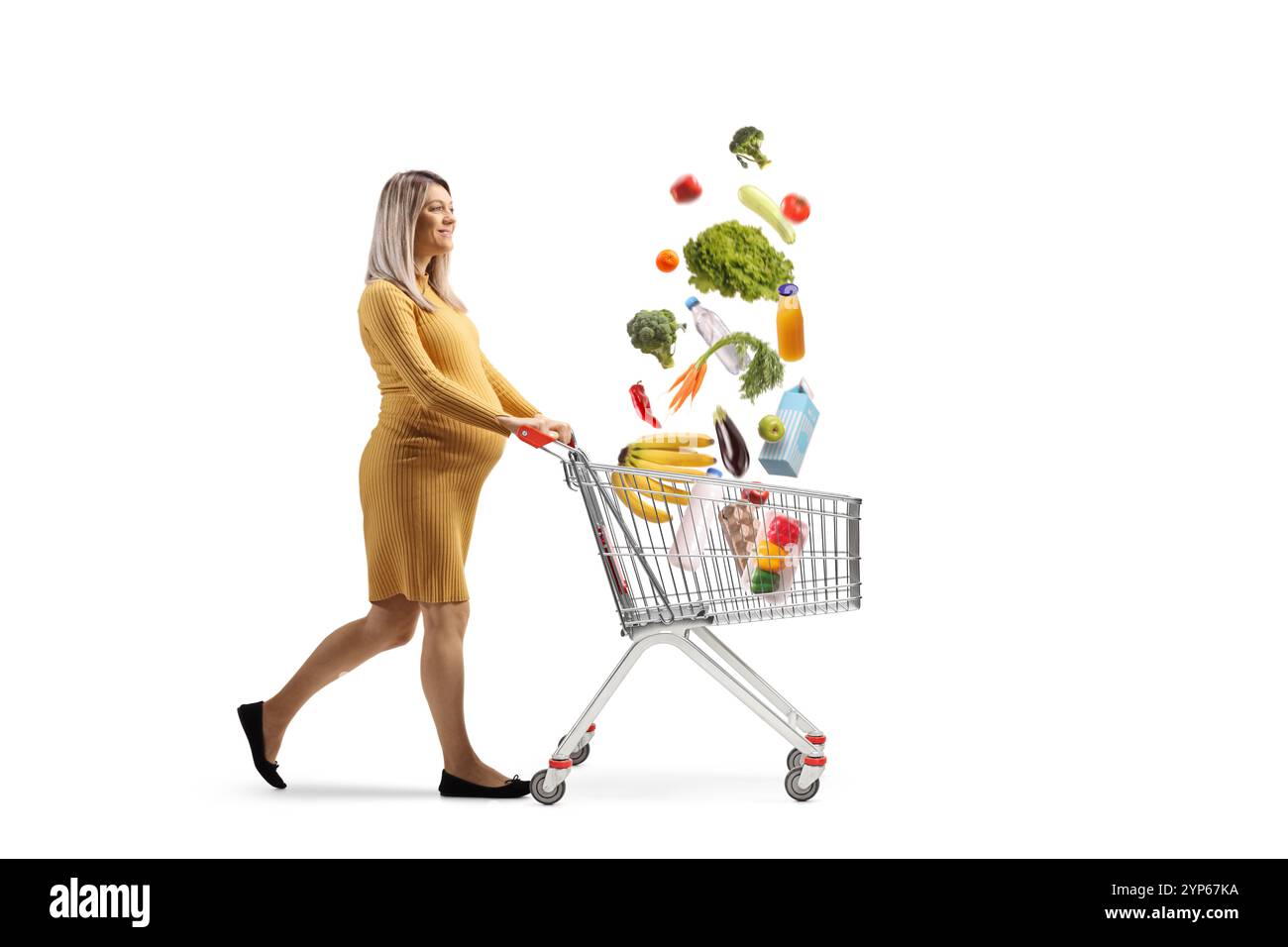 Full length profile shot of a pregnant woman pushing a shopping cart ...