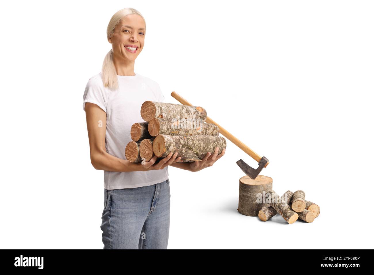 Young woman cutting firewood with an axe isolated on white background ...