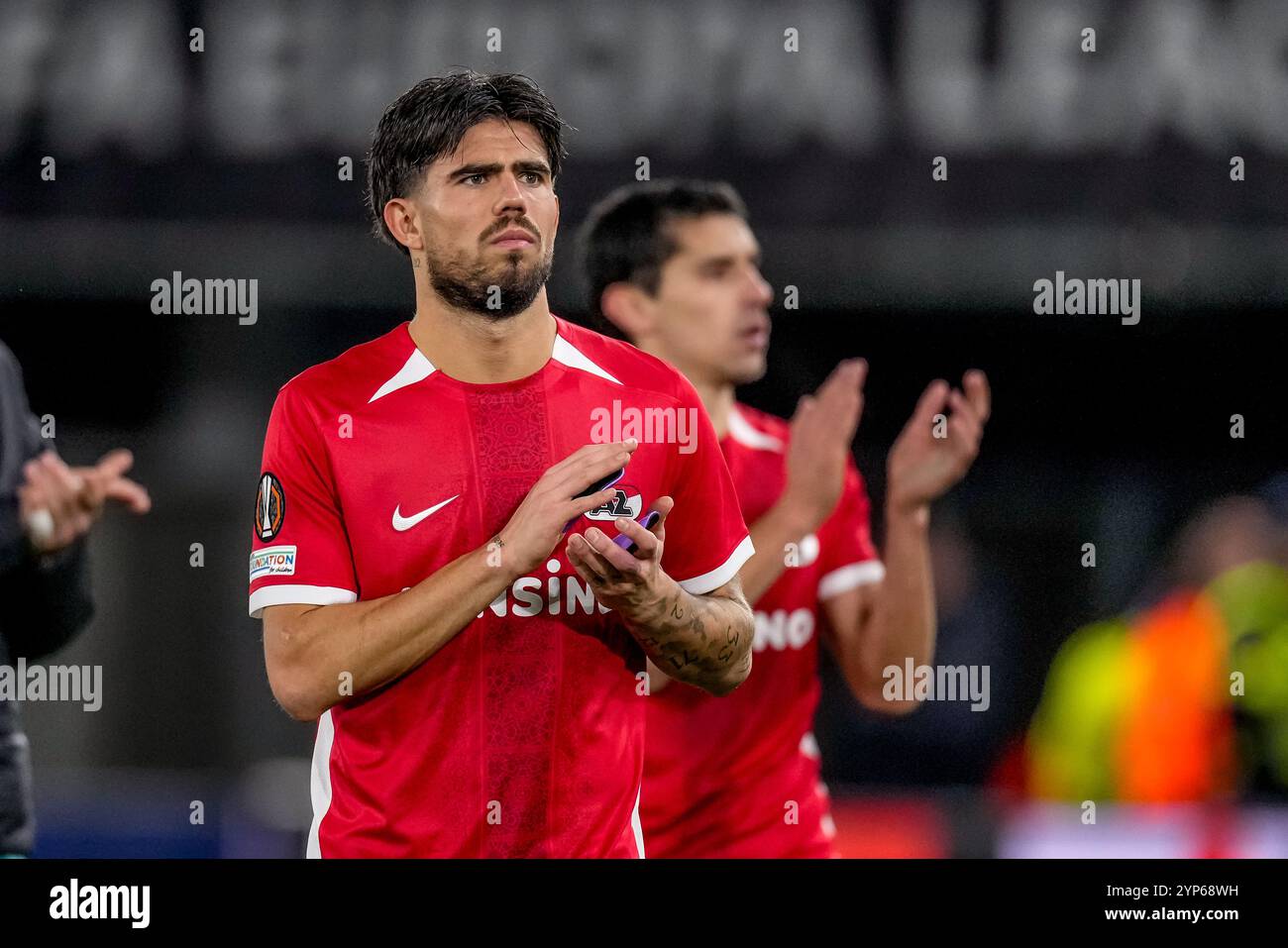ALKMAAR, NETHERLANDS - NOVEMBER 28: Denso Kasius of AZ Alkmaar applauds ...