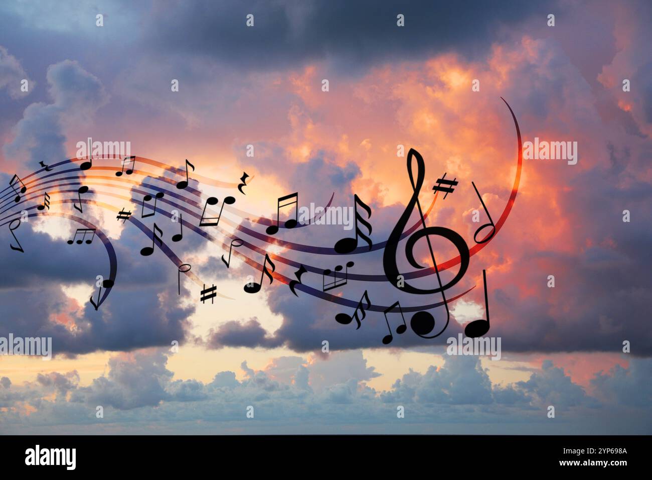Musical symbols in beautiful sunset sky with clouds Stock Photo - Alamy