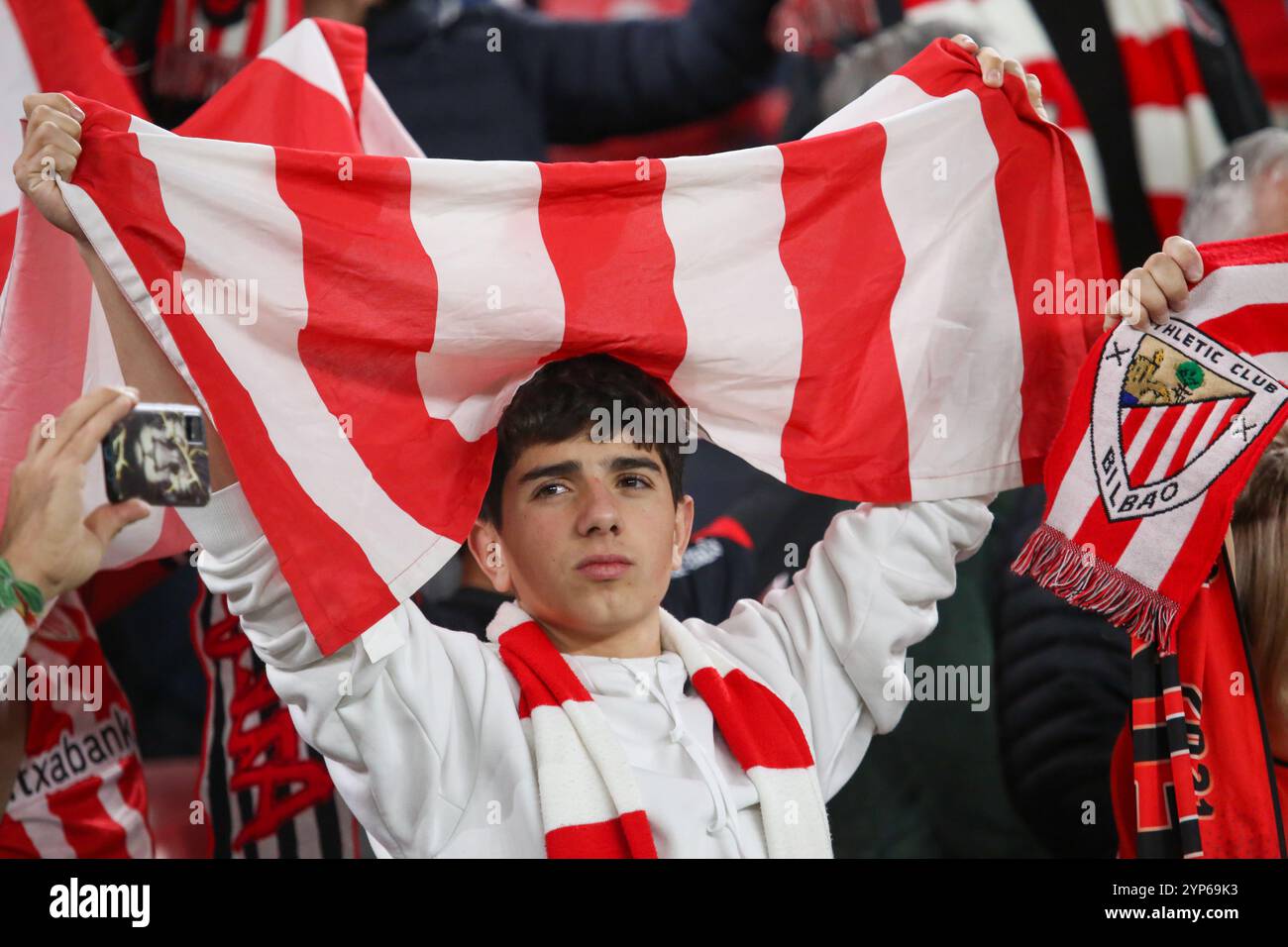 Bilbao, Spain, 28th November, 2024: An Athletic Club fan with a flag ...