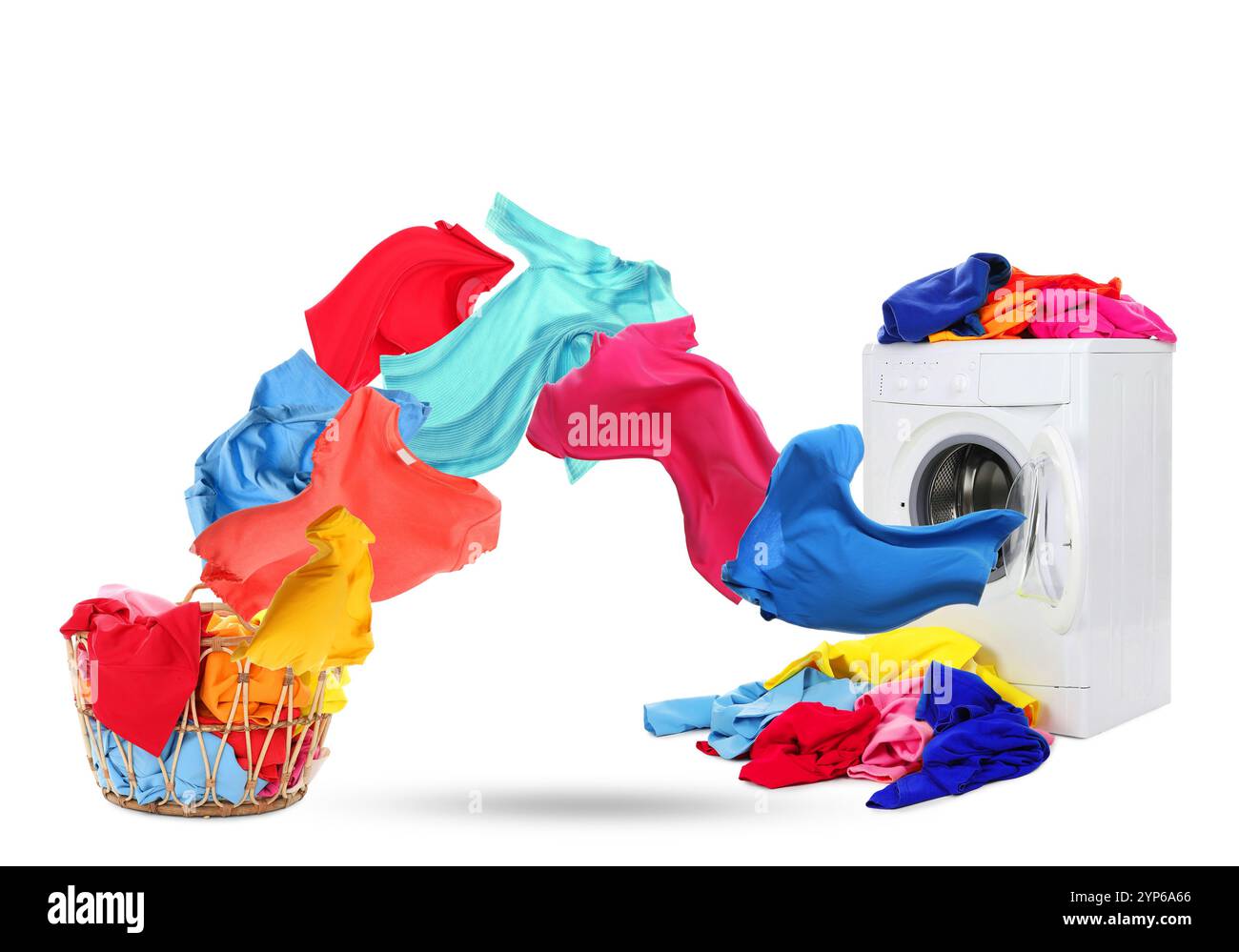 Clean colorful clothes flying out of washing machine into laundry ...