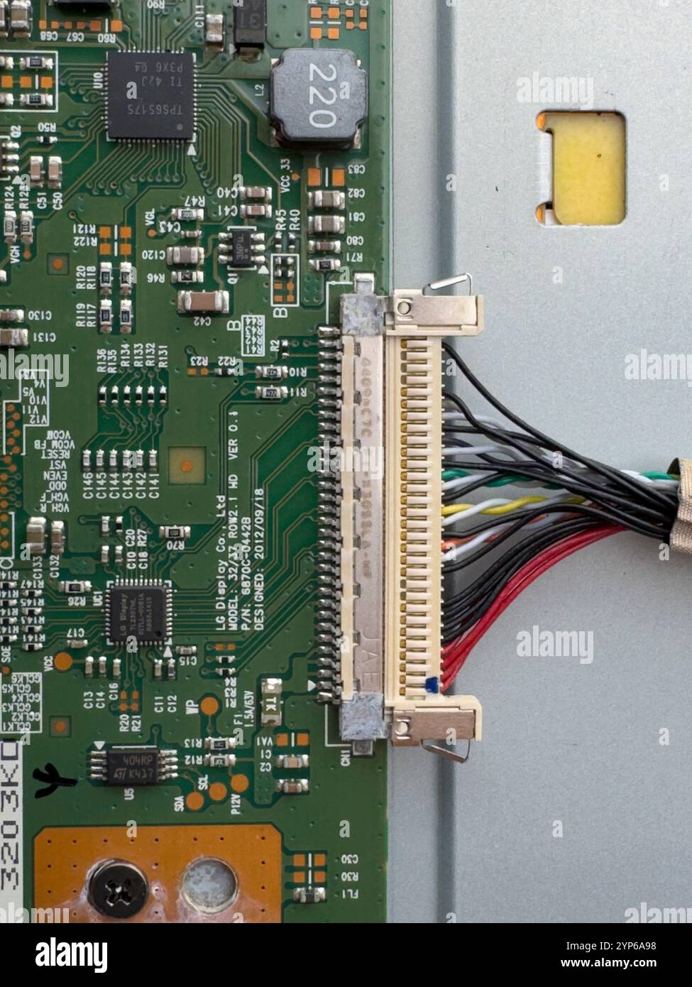 Old circuit board with small and large parts and connectors Stock Photo ...