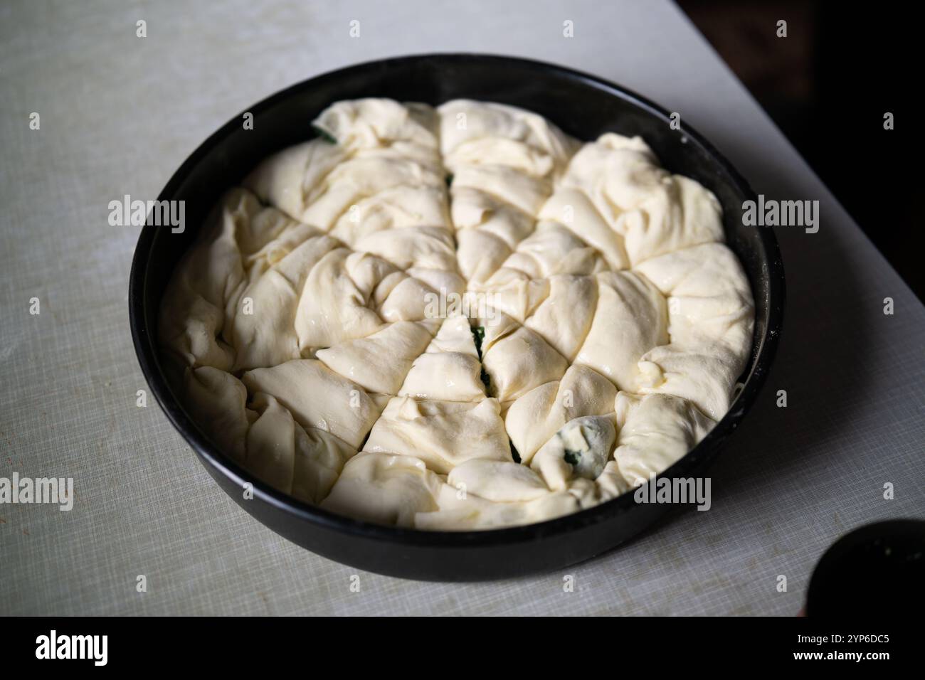 Raw pie in a pan before baking Stock Photo - Alamy