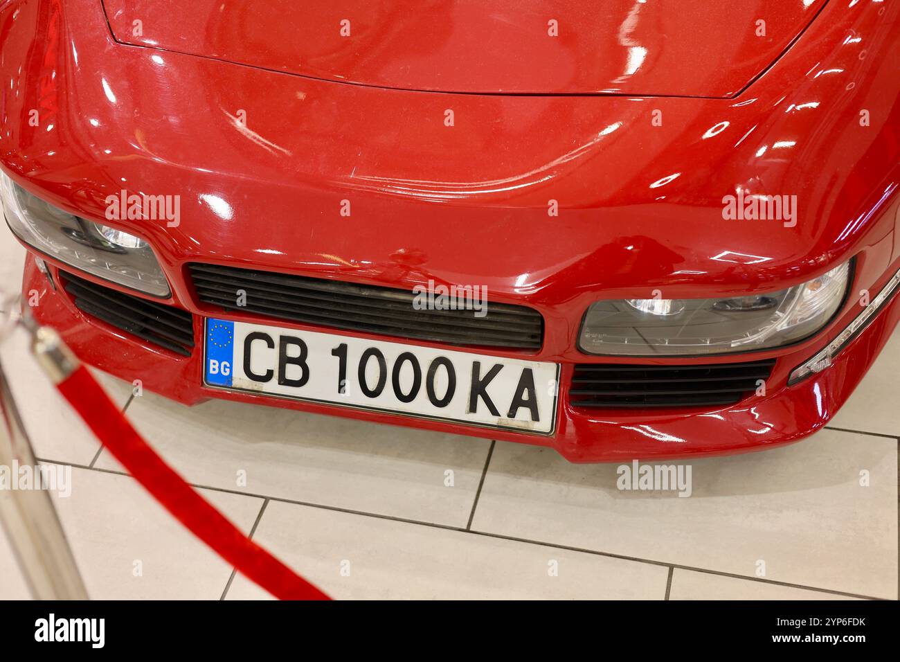 A collection of restored classic and luxury cars displayed at a vintage ...