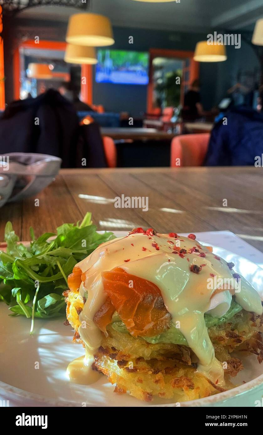 Stack of hash browns with salmon and poached egg on the top Stock Photo ...