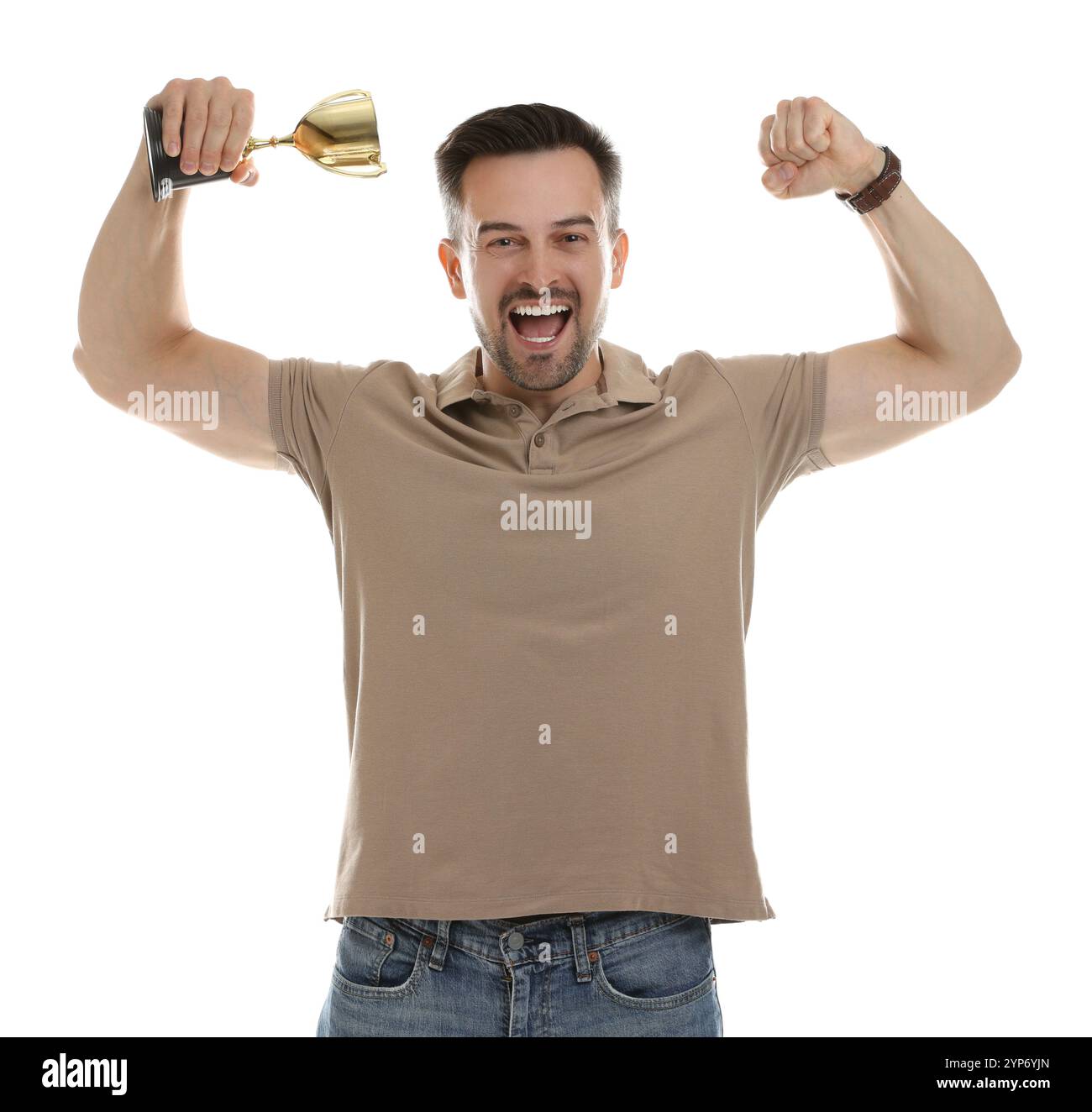 Happy winner with golden trophy cup showing his biceps on white ...