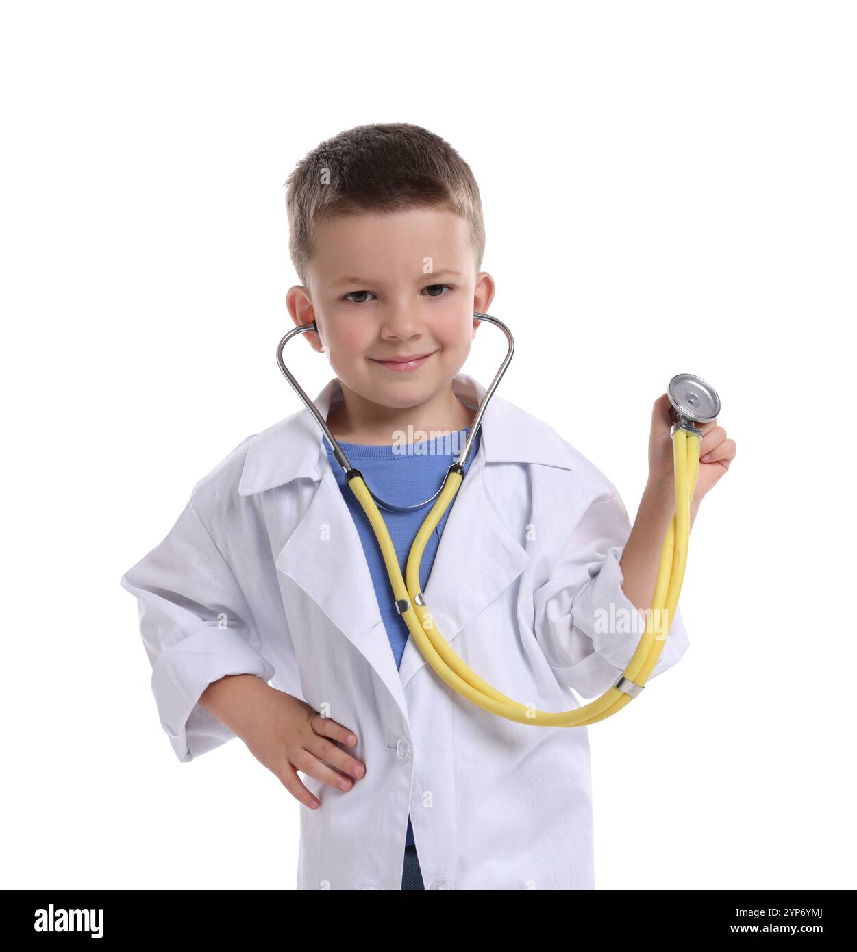 Little boy with stethoscope pretending to be doctor on white background ...