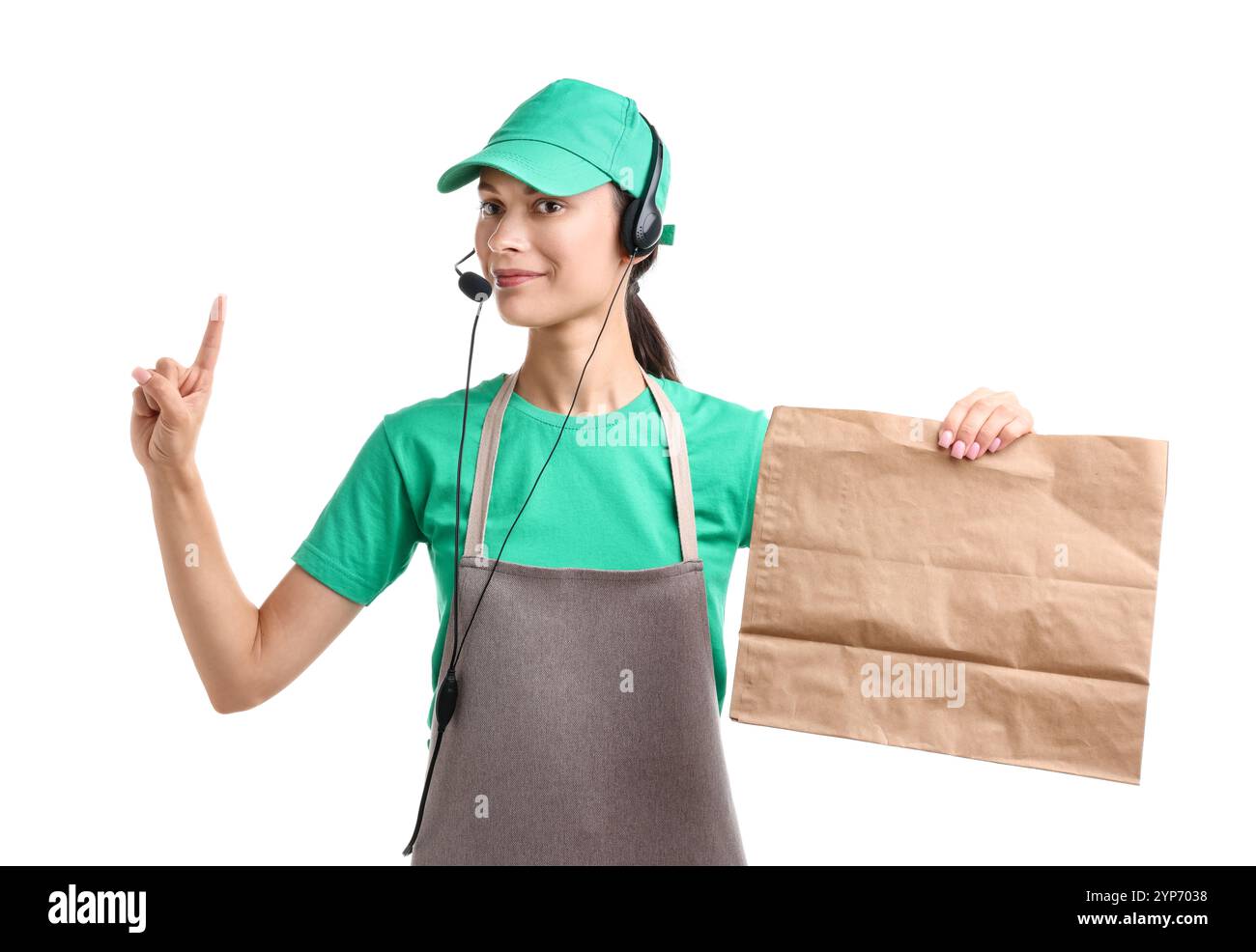 Fast-food worker with paper bag on white background Stock Photo - Alamy