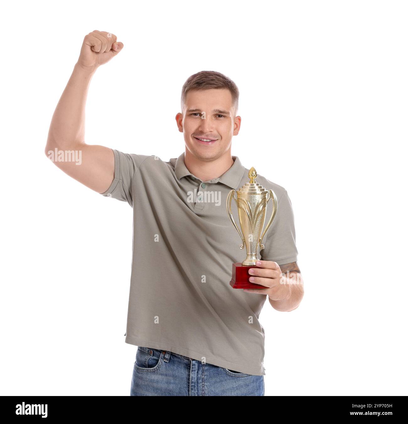 Happy winner with golden trophy cup on white background Stock Photo - Alamy