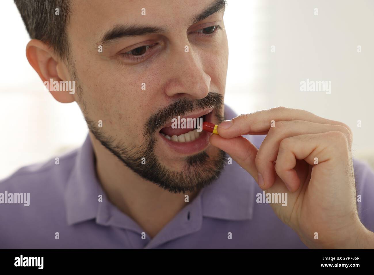 Sick man taking medicament hi-res stock photography and images - Alamy