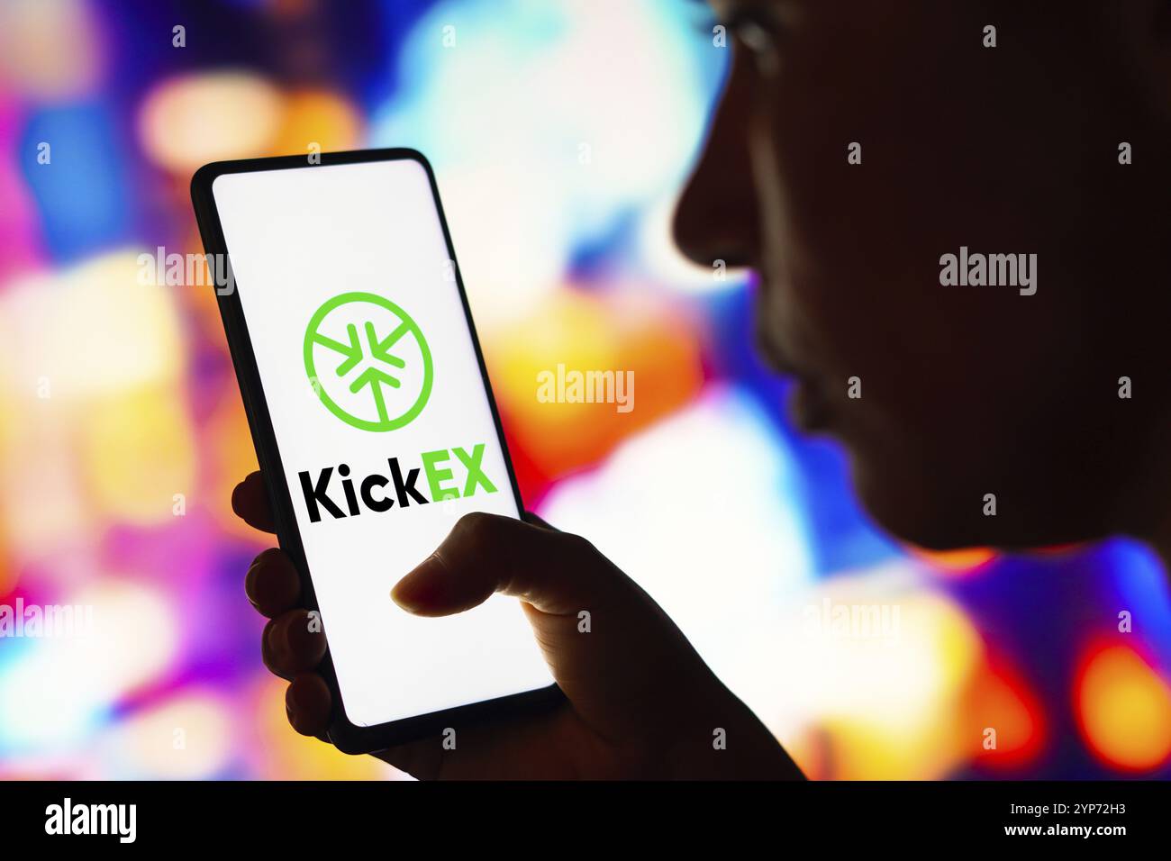 In this photo illustration, the KickEX logo seen displayed on a ...