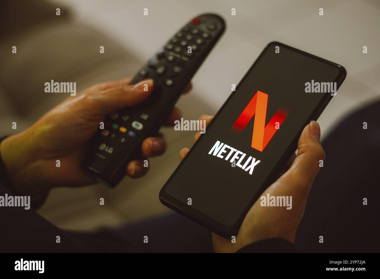 In this photo illustration, the Netflix logo seen displayed on a ...