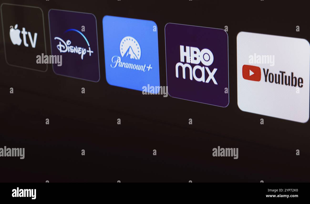In this photo illustration the Apple TV, Disney Plus, Paramount Plus ...