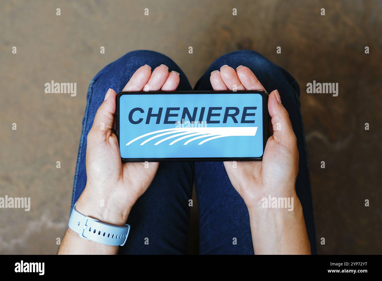 In this photo illustration, the Cheniere Energy logo is displayed on a ...