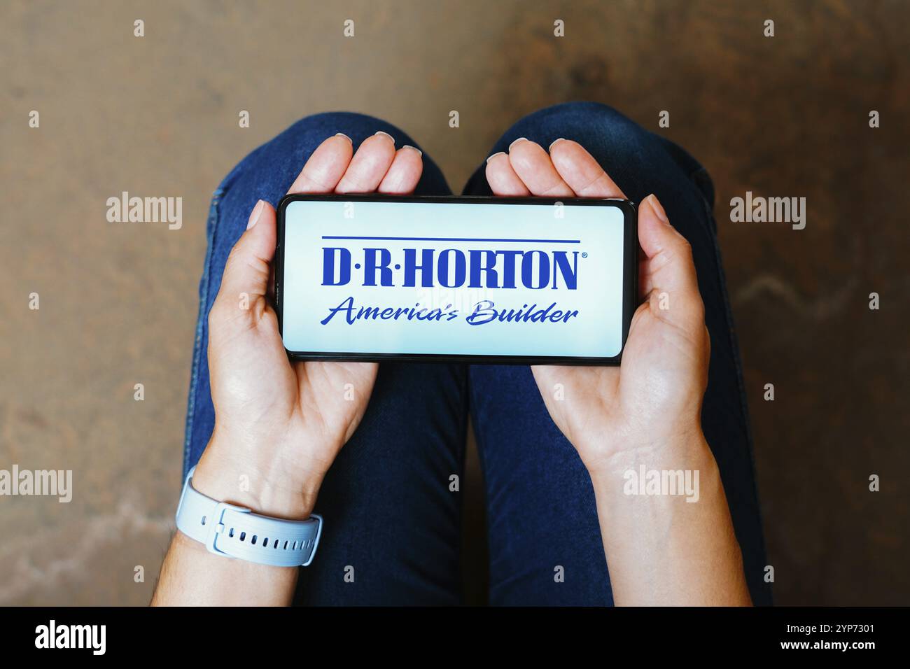 In this photo illustration, the DR Horton logo is displayed on a ...