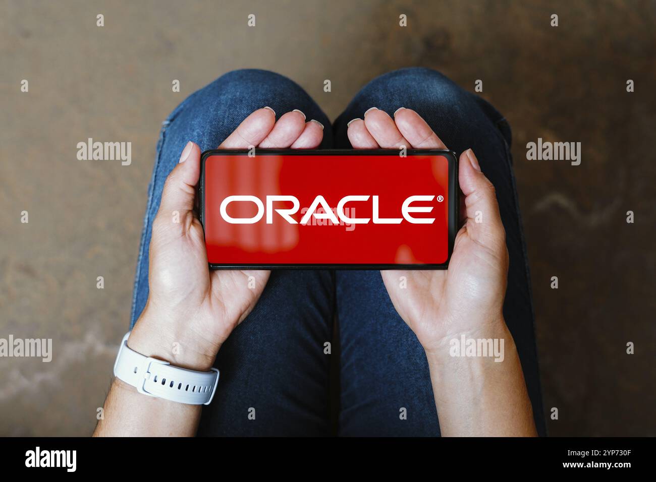 In this photo illustration, the Oracle Corporation logo is displayed on ...