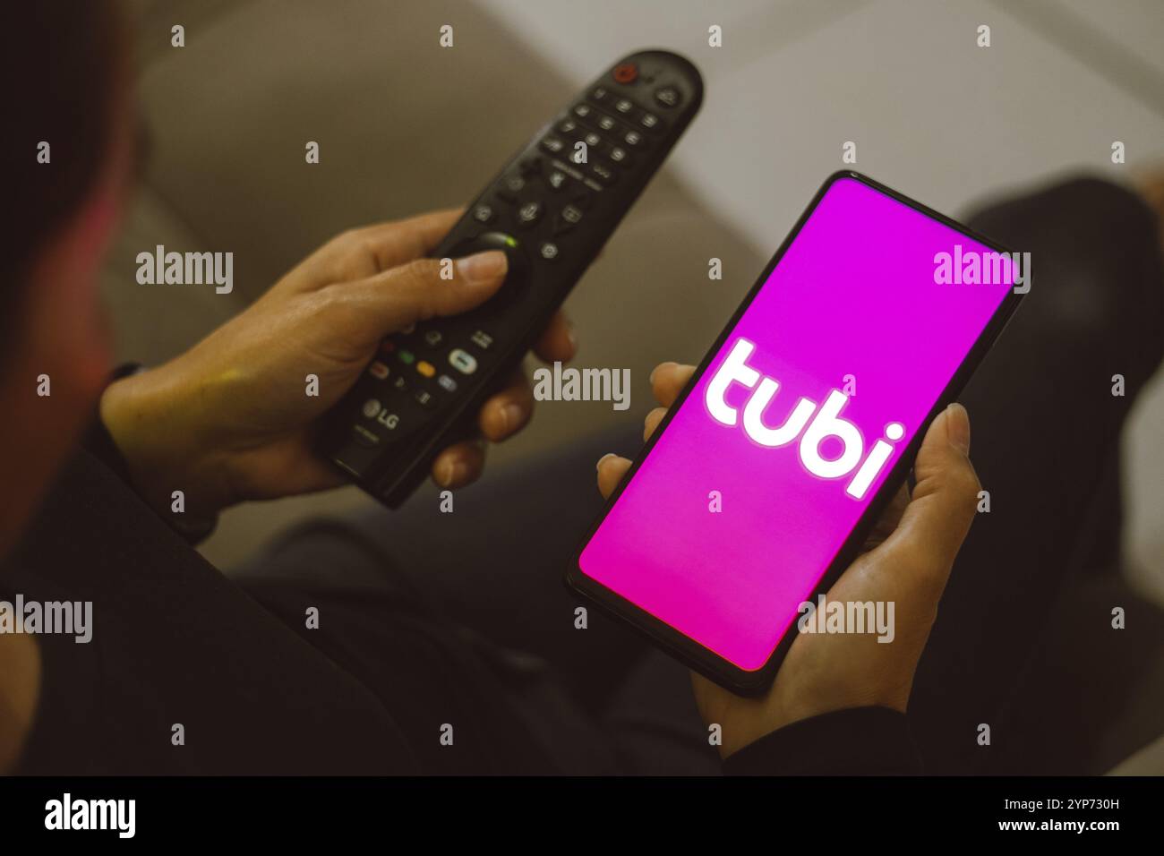 In this photo illustration, the Tubi logo seen displayed on a ...