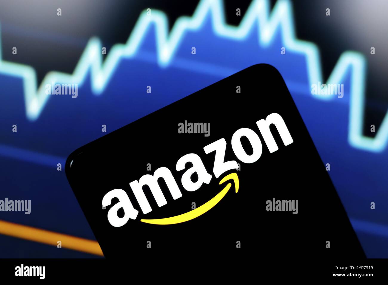 In this photo illustration, the Amazon logo is displayed on a ...